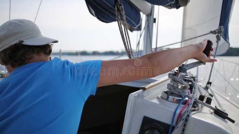 Boy Turn Handle and Touch Rope on Sailing Yacht at Stock Footage ...