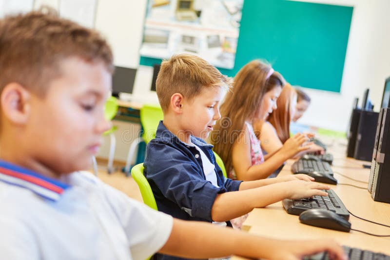 Boy Typing on Keyboard in Computer Class Stock Photo - Image of ...