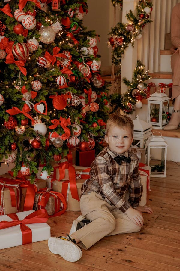 Boy Under a Christmas Tree with Red Toys Stock Image - Image of love ...