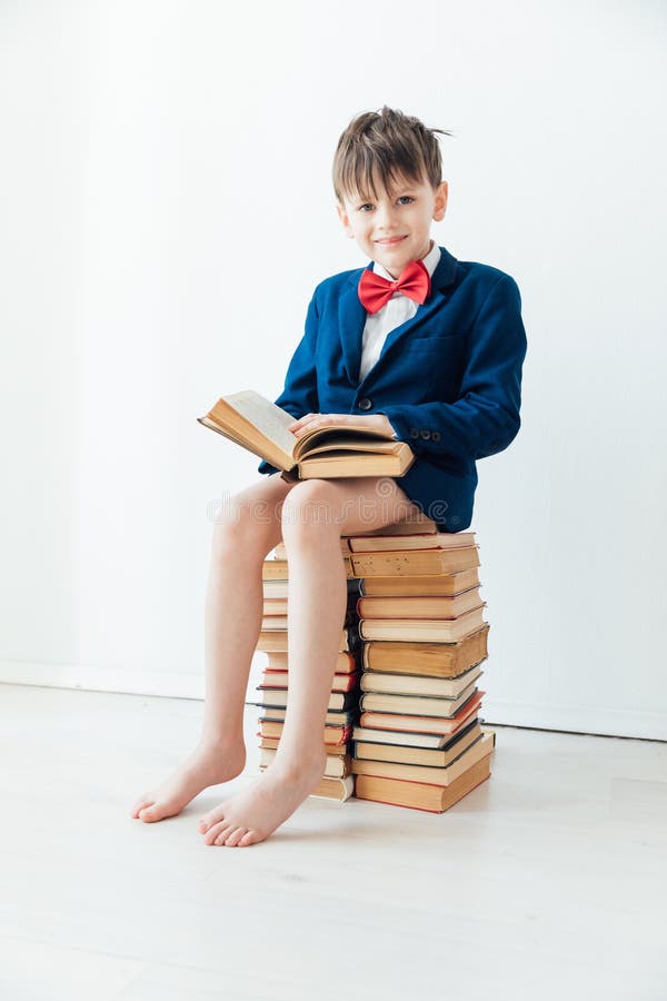 A Boy in Underpants is Sitting with Books Stock Photo - Image of learn, activities: 346097736