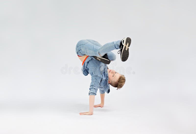 A Boy in an Unusual Breakdance Pose, Dance and Gymnastic Position Stock ...