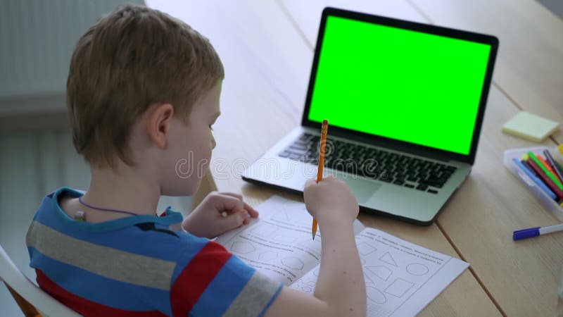 Boy Uses Green Screen Chroma Key Laptop for Learning on Online Class ...