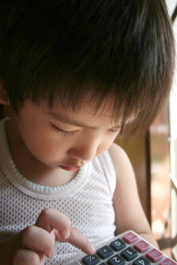 Boy using calculator stock photo. Image of preschool, youth - 849632