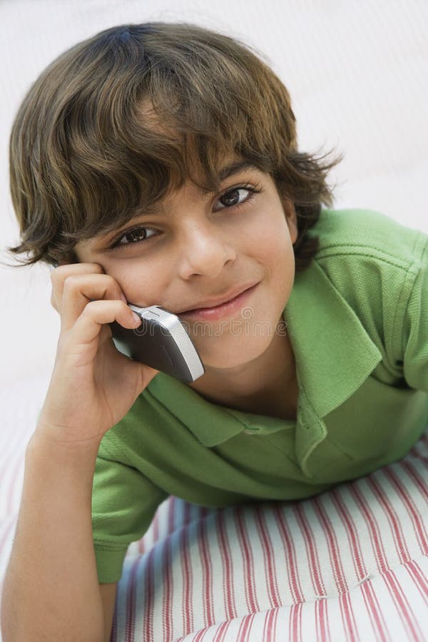 Boy Using Cell Phone stock image. Image of cute, relaxation - 29662547