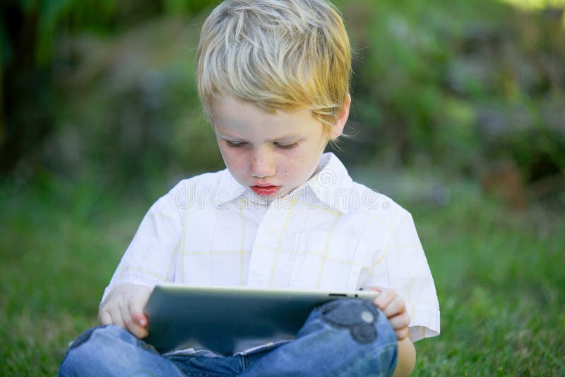 Boy using a computer. stock photo. Image of game, communicate - 36185166