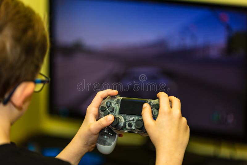 Boy Using Controller To Play Video Games Stock Image - Image of holding ...