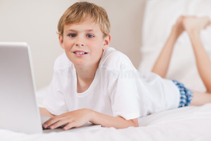 Boy using a laptop stock photo. Image of person, caucasian - 22370990