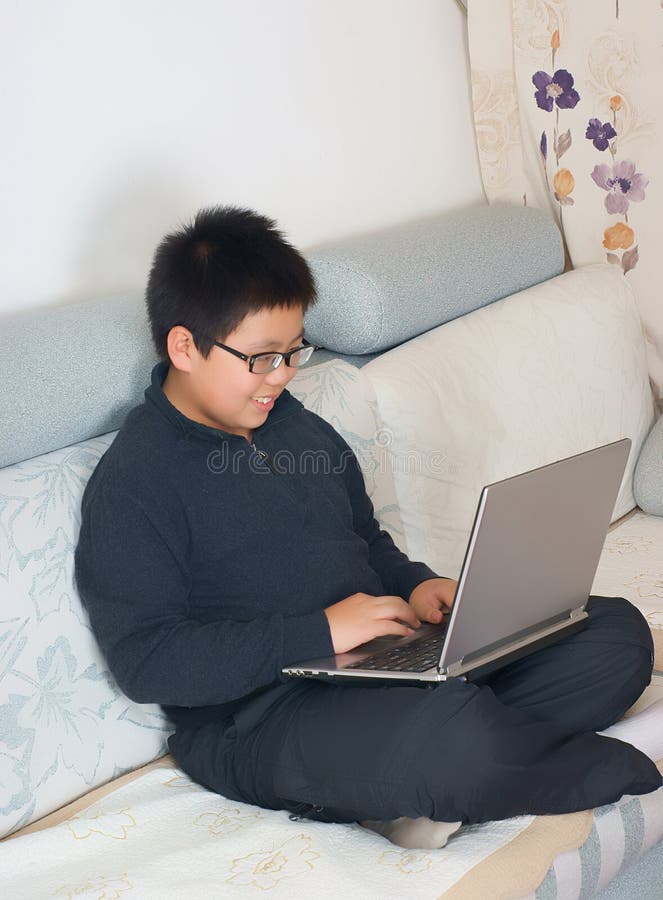 Boy with computer stock image. Image of cute, person, home - 4416155