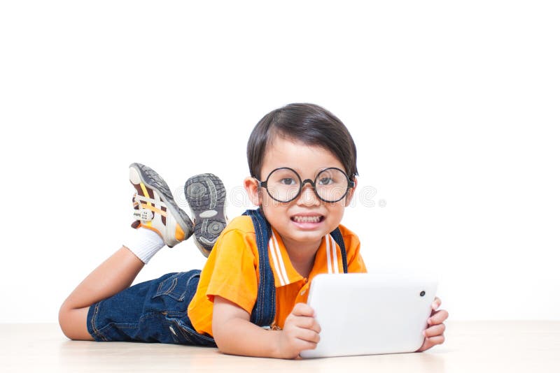 Boy using laptop computer stock photo. Image of cheerful - 45120496