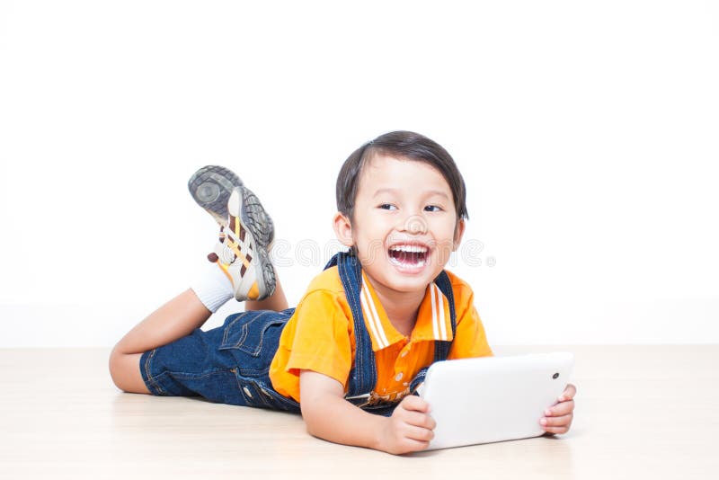 Boy using laptop computer stock image. Image of couch - 45120651