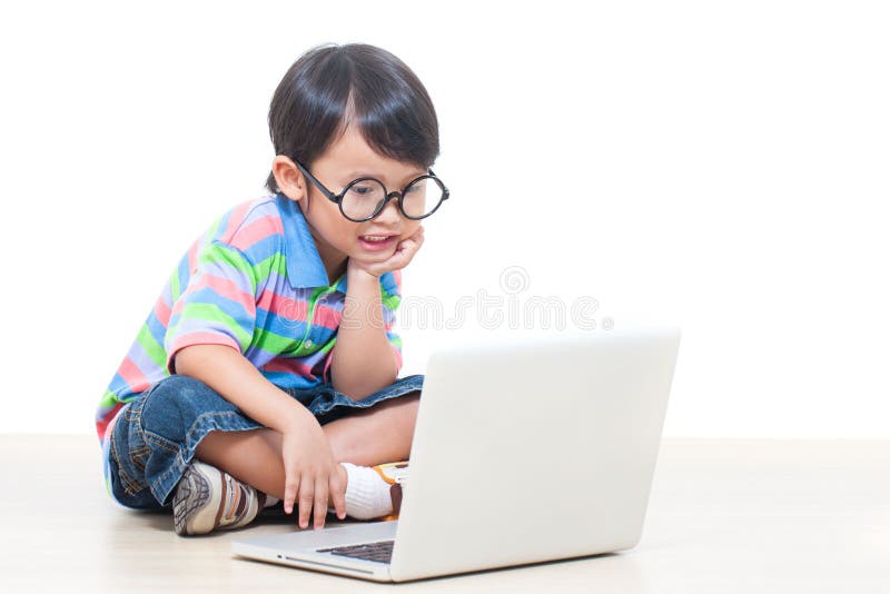 Boy using laptop computer stock photo. Image of asian - 45144588