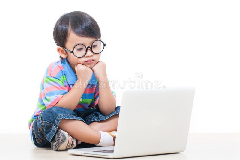 Boy using laptop computer stock image. Image of communication - 45144639