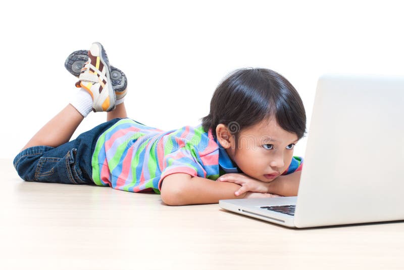 Boy using laptop computer stock photo. Image of children - 45144728