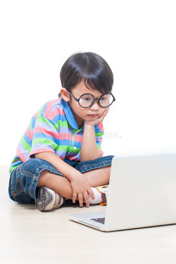 Boy using laptop computer stock photo. Image of child - 45144736
