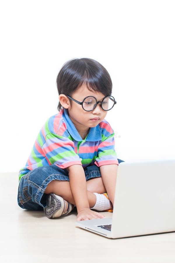 Boy using laptop computer stock image. Image of computer - 45144741