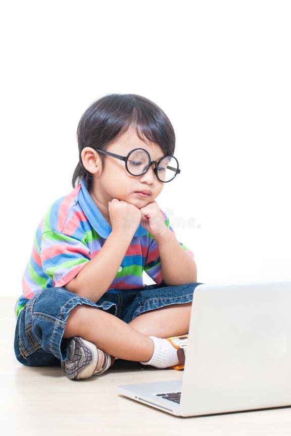 Boy using laptop computer stock image. Image of cute - 45144847