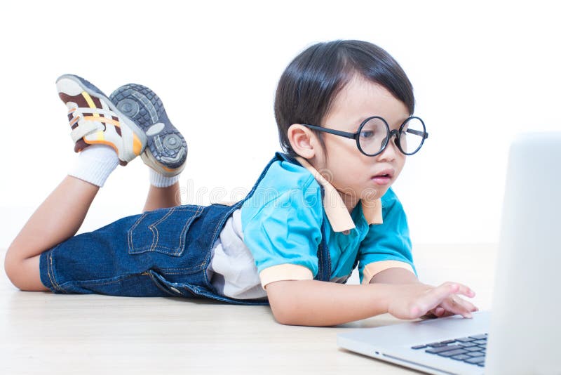 Boy using laptop computer stock photo. Image of male - 45144850