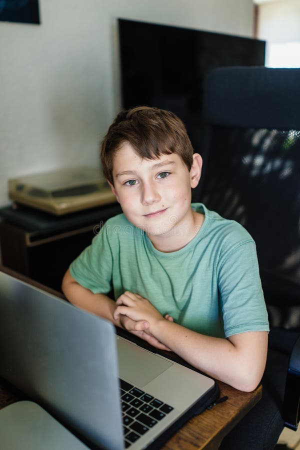 Boy using laptop stock image. Image of laptop, elementary - 186665719