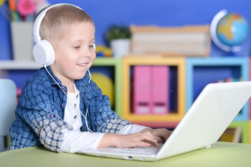 Boy using laptop stock image. Image of people, power - 106397385