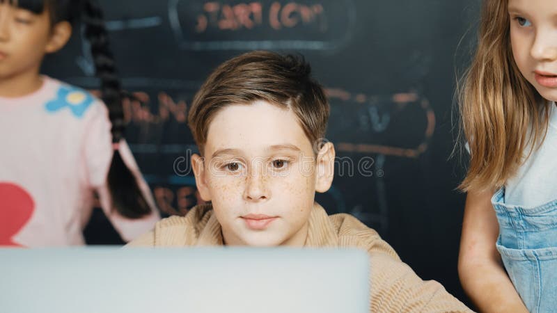 Boy Using Laptop Programing Engineering Code and Writing Program ...