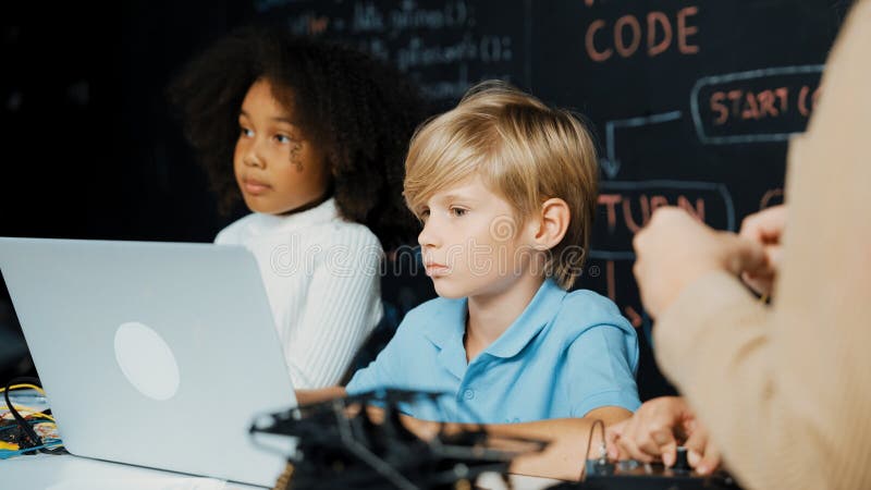 Boy Using Laptop Programing Engineering Code and Writing Program ...
