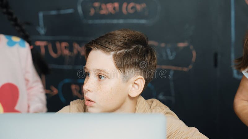 Boy Using Laptop Programing Engineering Code and Writing Program ...