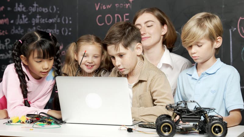 Boy Using Laptop Programing Engineering Code and Writing Program ...