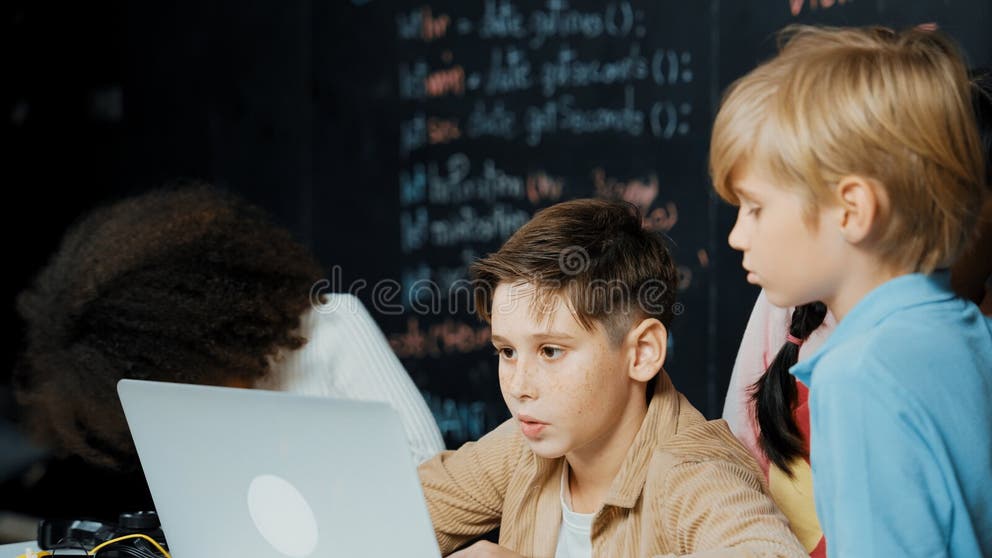 Boy Using Laptop Programing Engineering Code and Writing Program ...