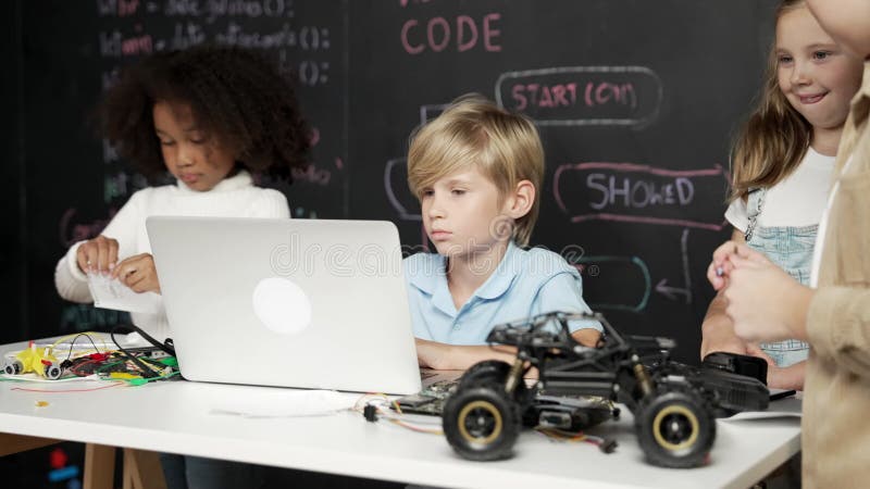 Boy Using Laptop Programing Engineering Code and Writing Program ...