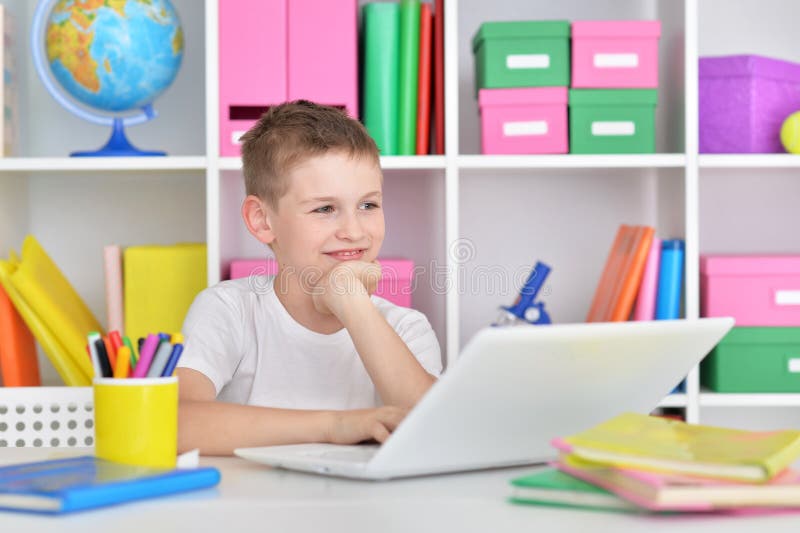 Boy using modern laptop stock image. Image of laptop - 95556413