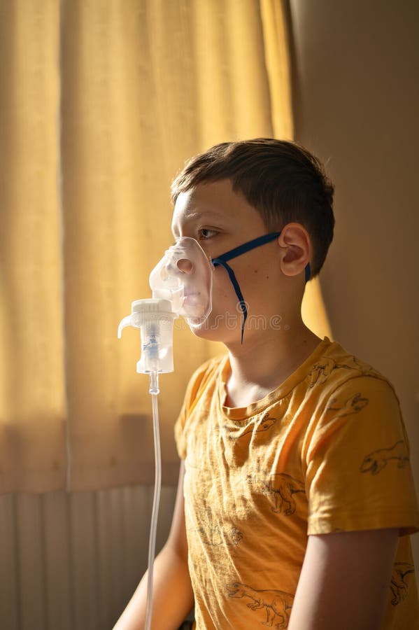 Boy Using a Nebulizer Inhaler at Home.Generated Image Stock Photo ...