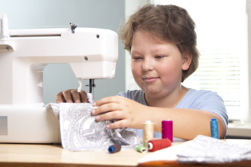 Boy Using Sewing Machine at Home To Make Crafts Stock Photo - Image of ...