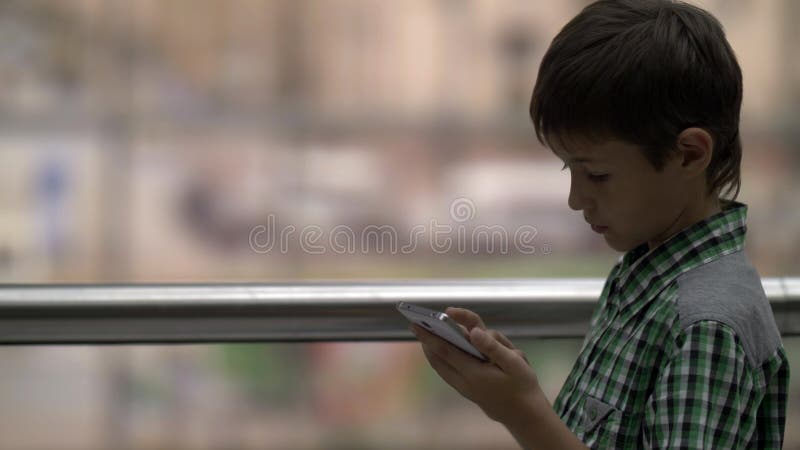 Boy Using Smartphone in the City, Have Fun Stock Photo - Image of phone ...