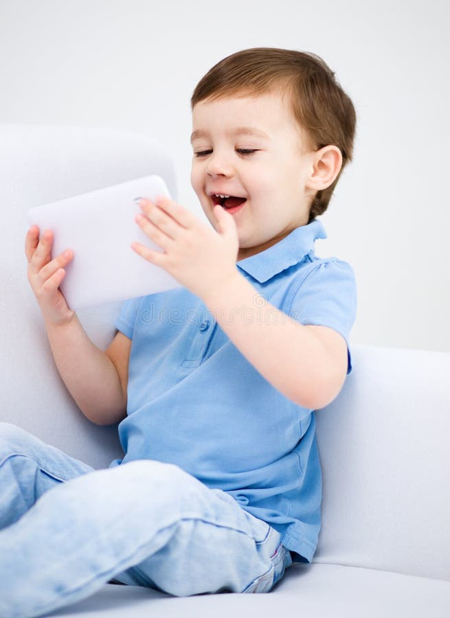 Boy using tablet stock image. Image of person, human - 37480925