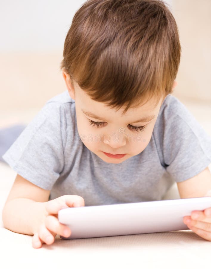 Boy using tablet stock image. Image of caucasian, people - 37524587