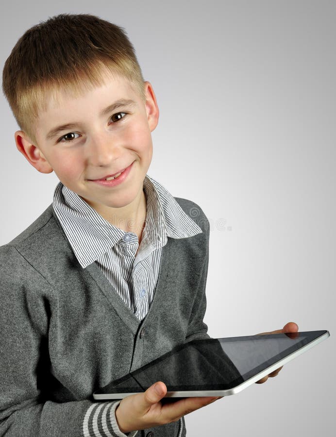 Child using a tablet PC stock image. Image of network - 36506747