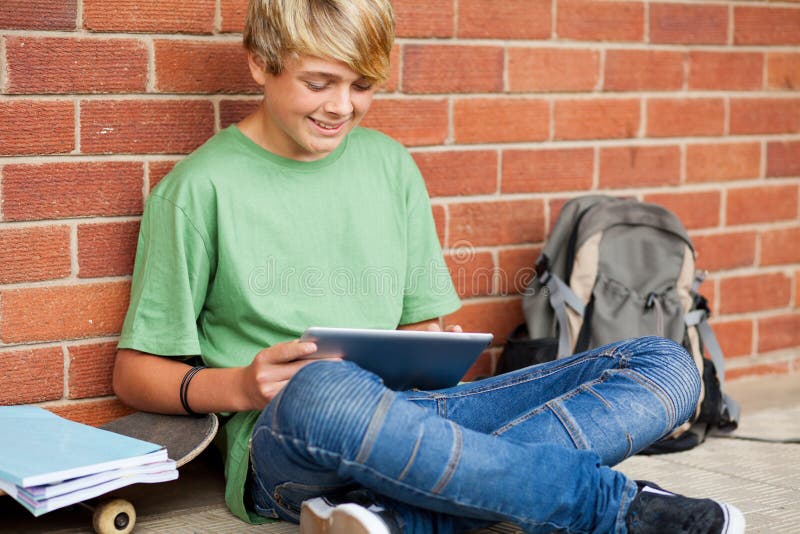 Boy using tablet computer stock image. Image of holding - 24782101