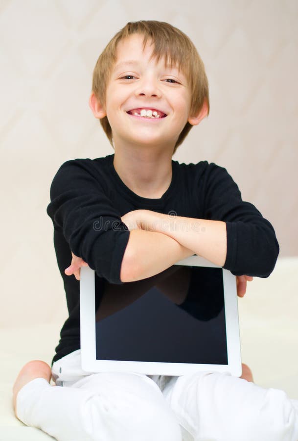 Boy using tablet computer stock image. Image of digital - 33124299