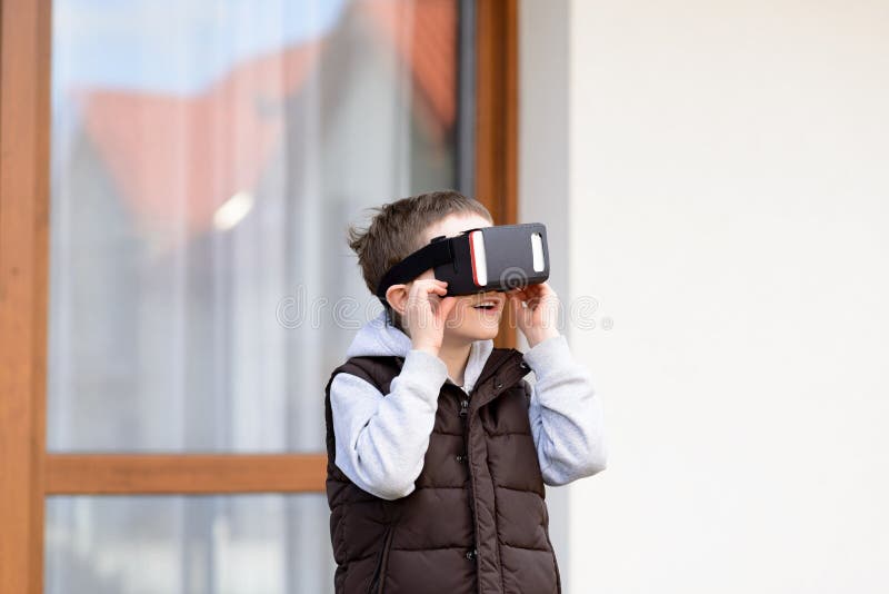 Boy Using VR Virtual Reality Goggles Stock Photo - Image of electronic ...