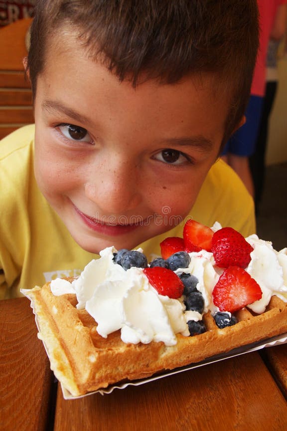 Boy they waffle stock image. Image of strawberries, child - 27456865