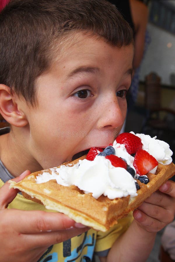 Boy they waffle stock image. Image of strawberries, taste - 27457827