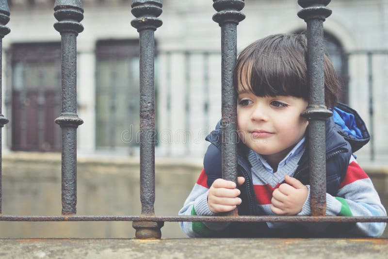 Boy waiting stock image. Image of bars, child, dream - 61402831