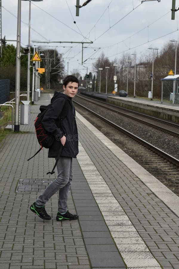 Boy waiting for the train stock photo. Image of lines - 108698158