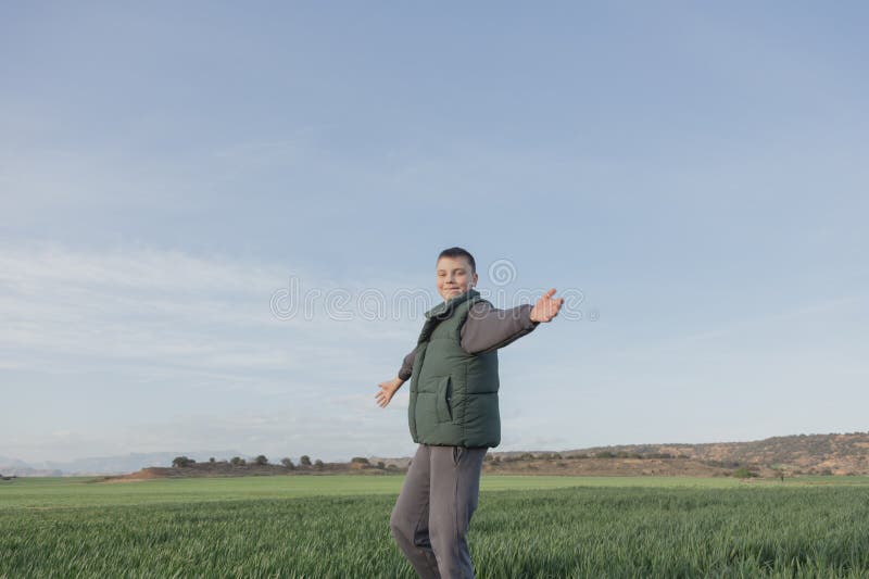 Boy walking in nature stock image. Image of hands, smile - 275003557