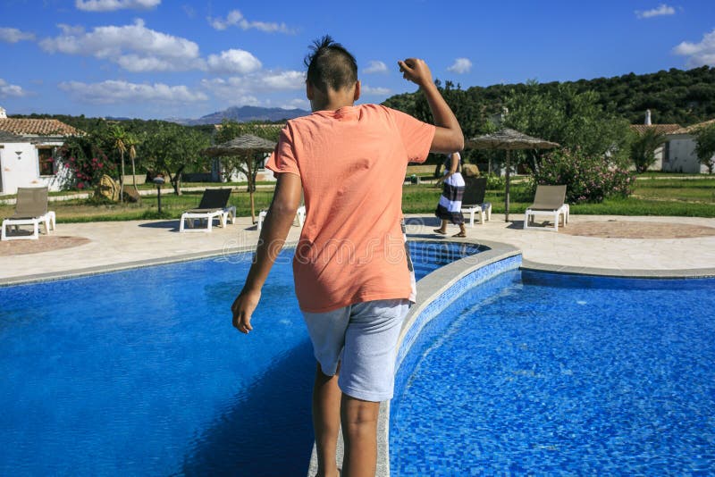 Boy Walking Over the Swimming Pool Stock Photo - Image of happiness ...