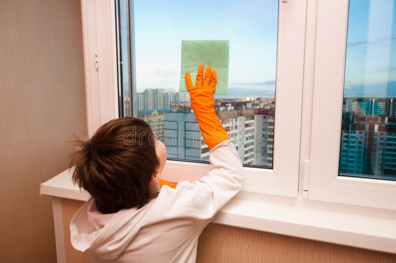 Boy washes a window stock photo. Image of wash, house - 30614458