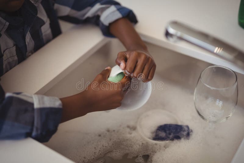 Boy Washing Cup in Kitchen Sink Stock Photo - Image of cleaning ...