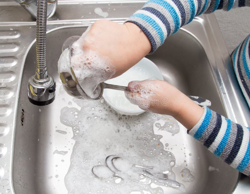 Boy Washing Dishes in the Kitchen Stock Photo - Image of young, kitchen ...