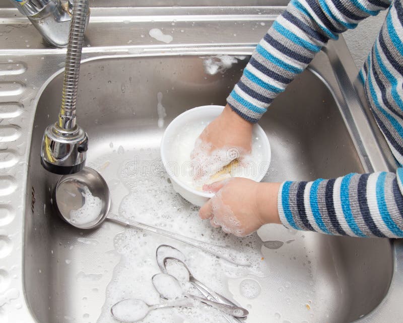 Boy Washing Dishes in the Kitchen Stock Photo - Image of dishes, hand ...