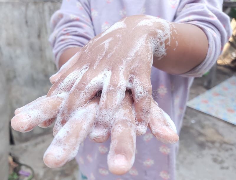 A boy washing his hands stock photo. Image of freshness - 171423024